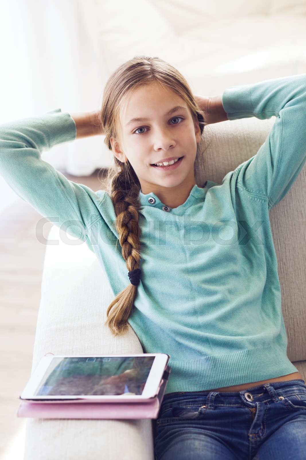 Child using ipad | Stock image | Colourbox