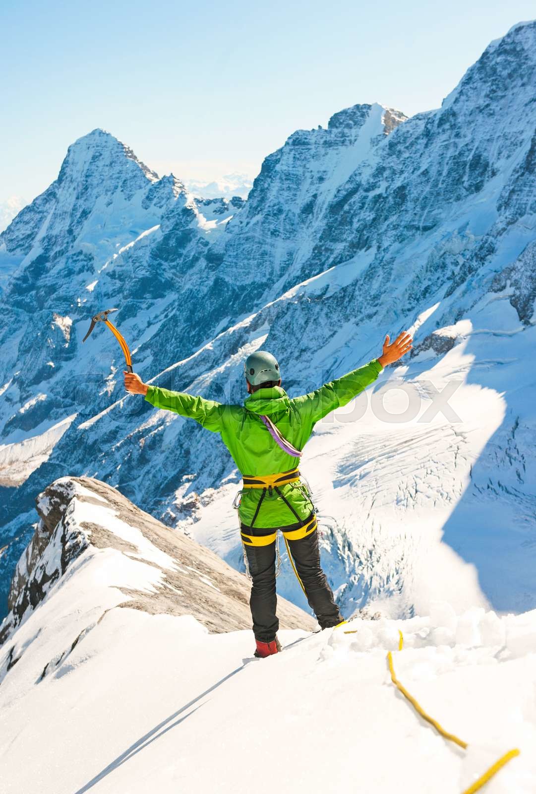 Group of climbers reaching the summit | Stock image | Colourbox