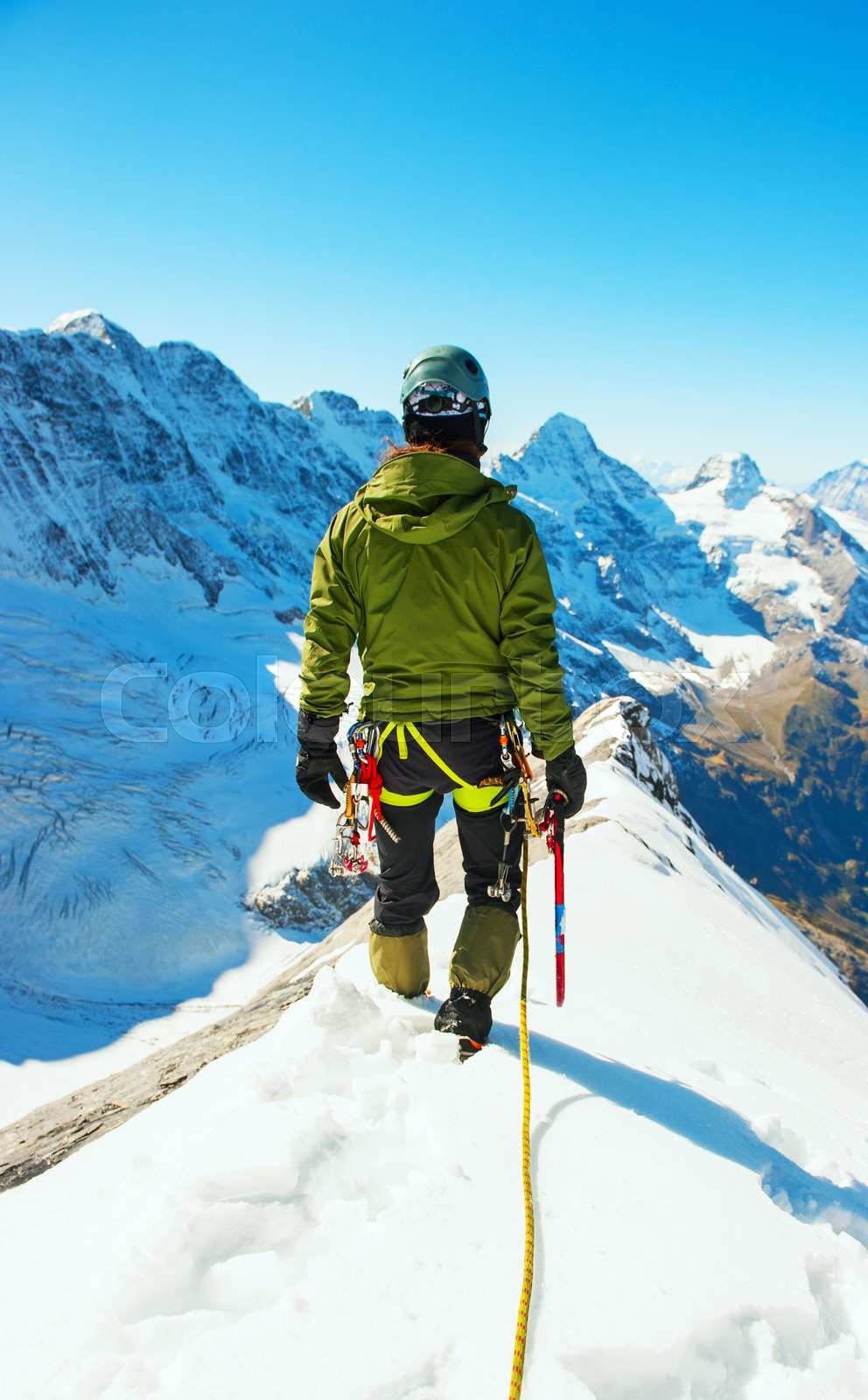 Group of climbers reaching the summit | Stock image | Colourbox
