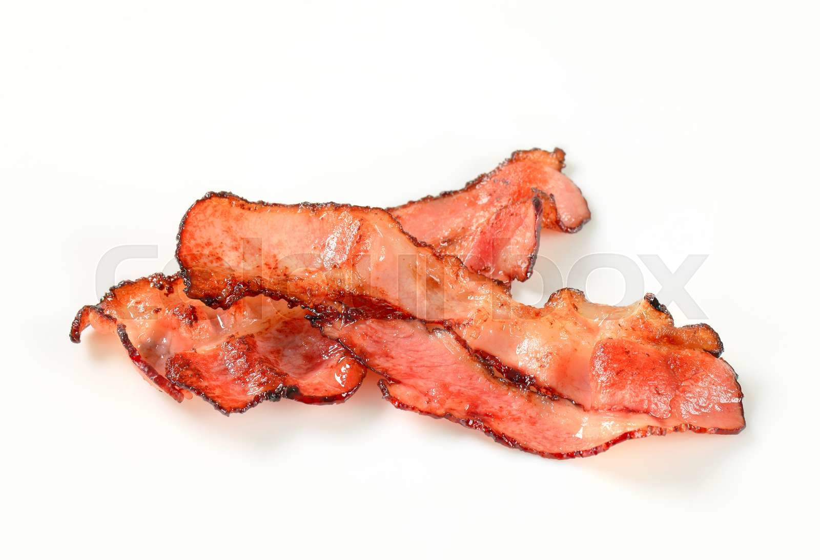 Pan fried bacon strips | Stock image | Colourbox