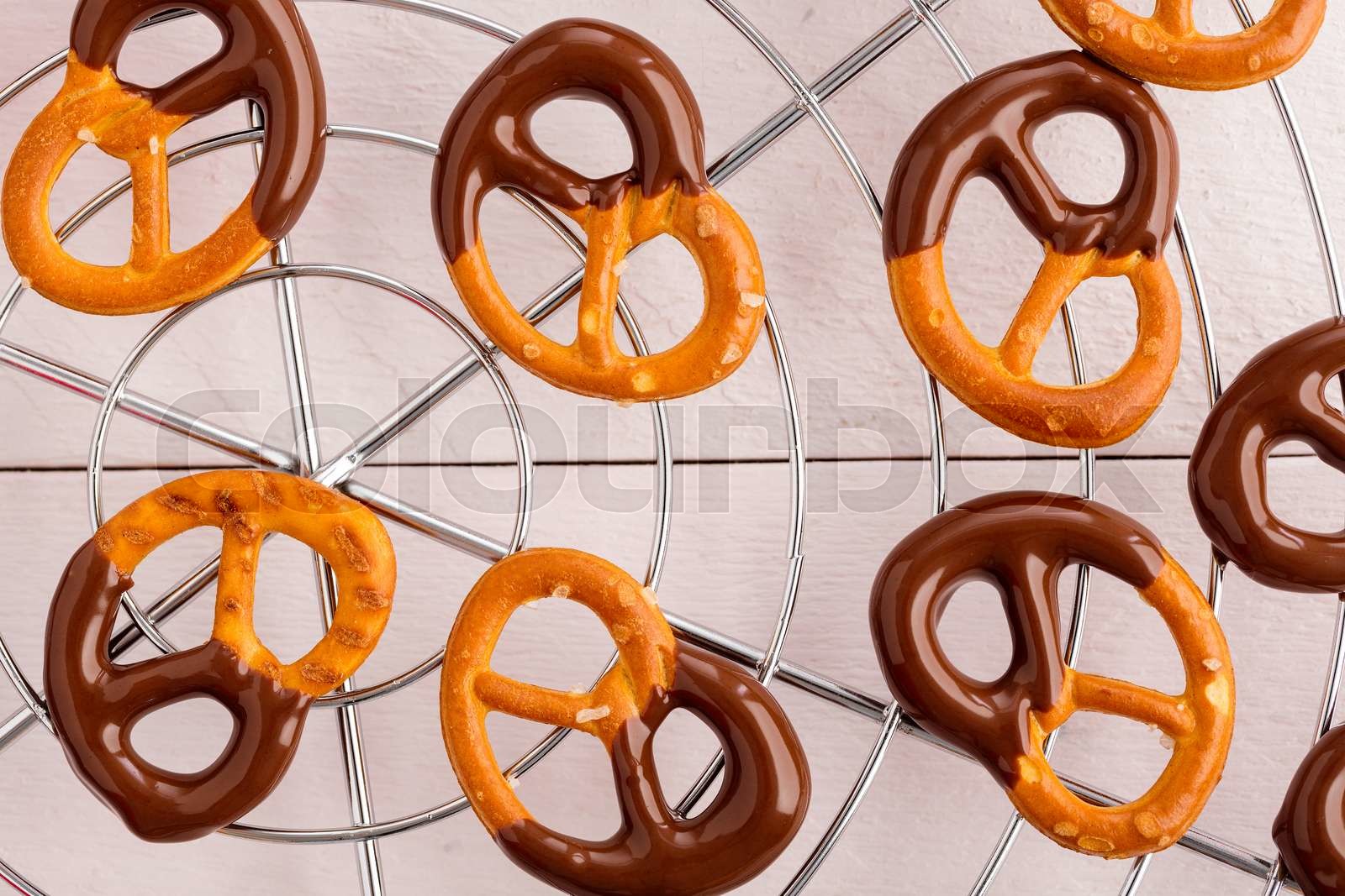 Pretzels coated with dark chocolate | Stock image | Colourbox