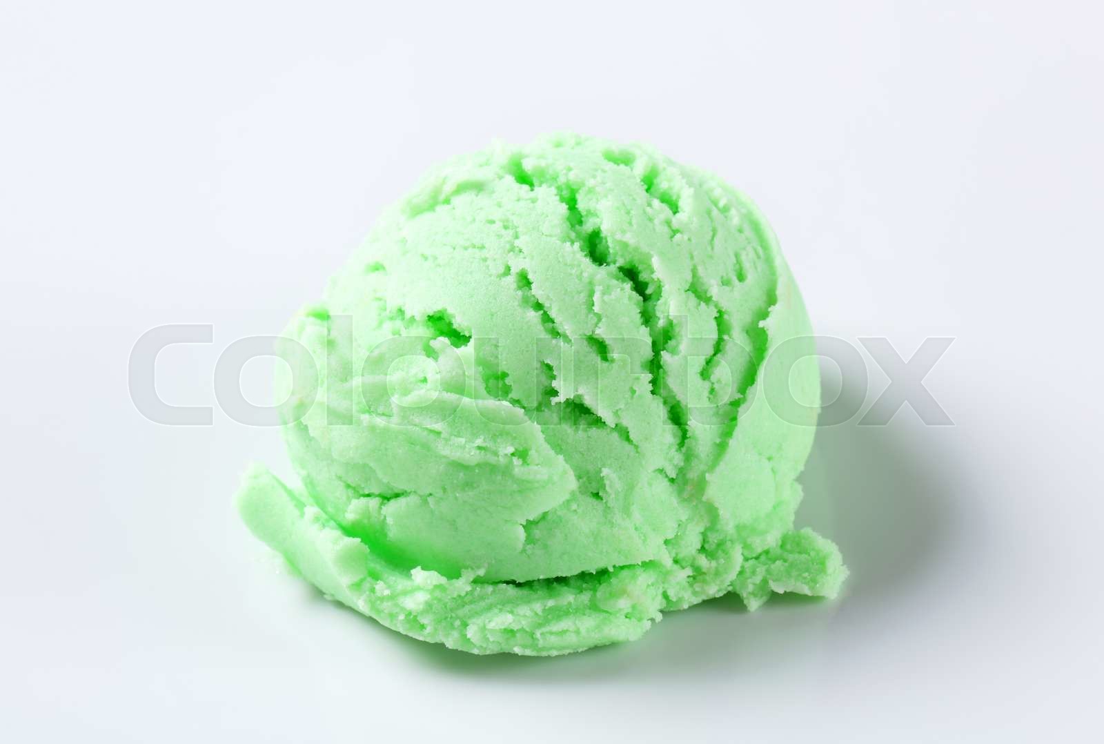 Scoop of green ice-cream | Stock image | Colourbox