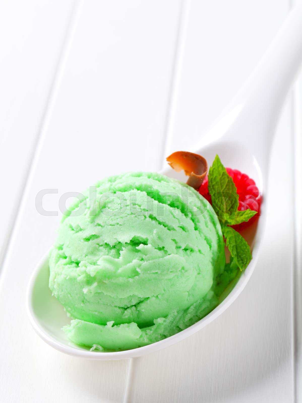 Scoop of green ice cream | Stock image | Colourbox