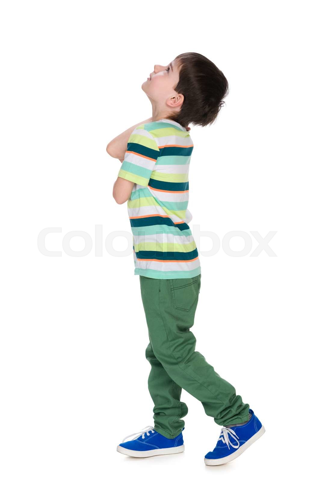 Little boy looks up | Stock image | Colourbox