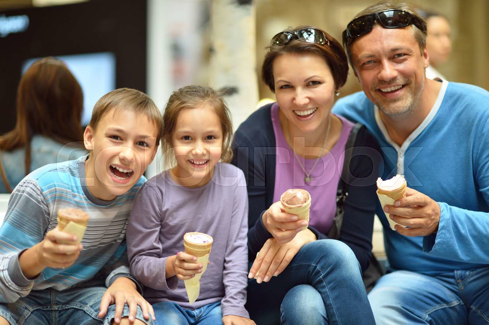 Family eating ice-creams | Stock image | Colourbox