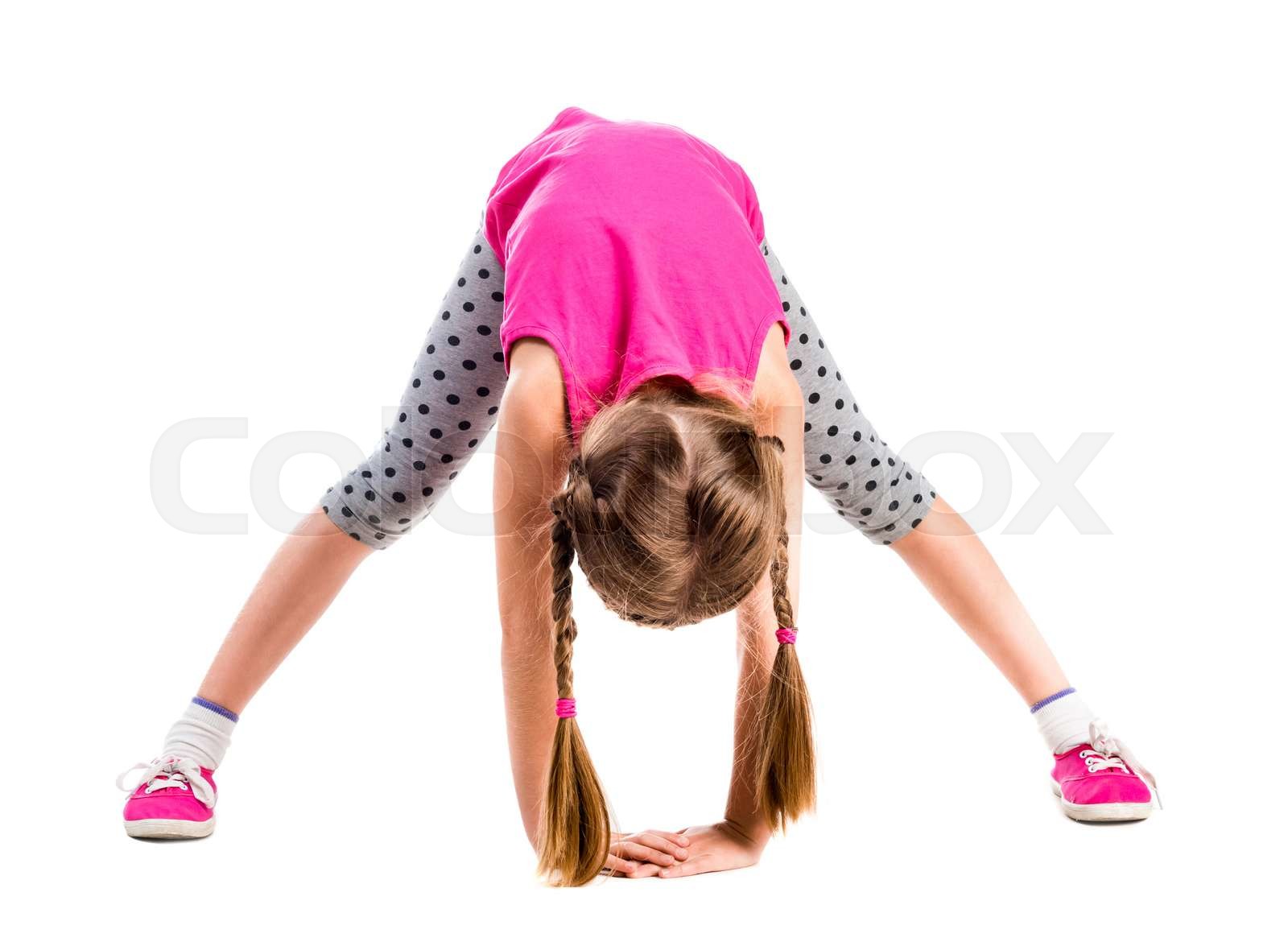 cute little girl stretching | Stock image | Colourbox