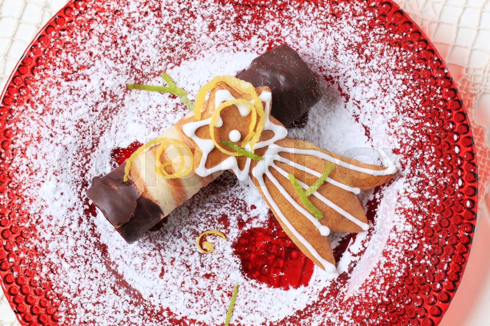 Chocolate dipped wafer cookie and gingerbread comet | Stock image ...