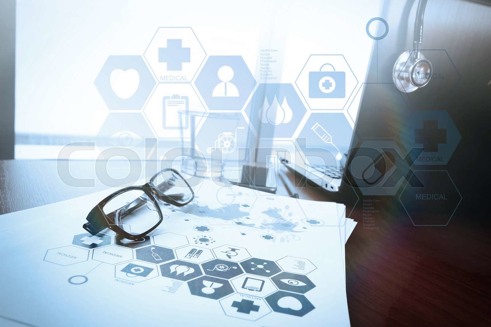 Doctor workspace with laptop computer in medical workspace office and ...