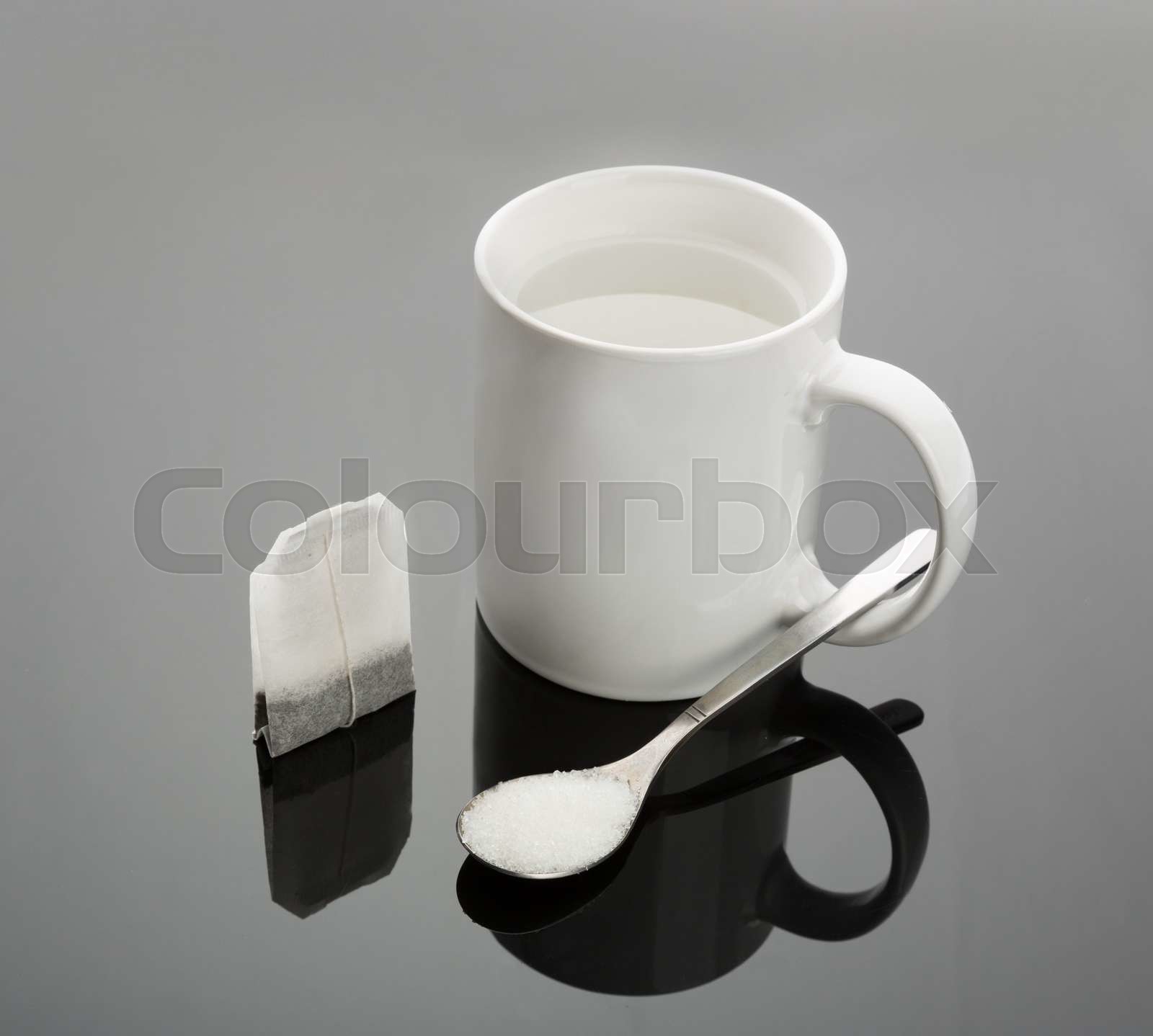 Cup, spoon and tea bag | Stock image | Colourbox