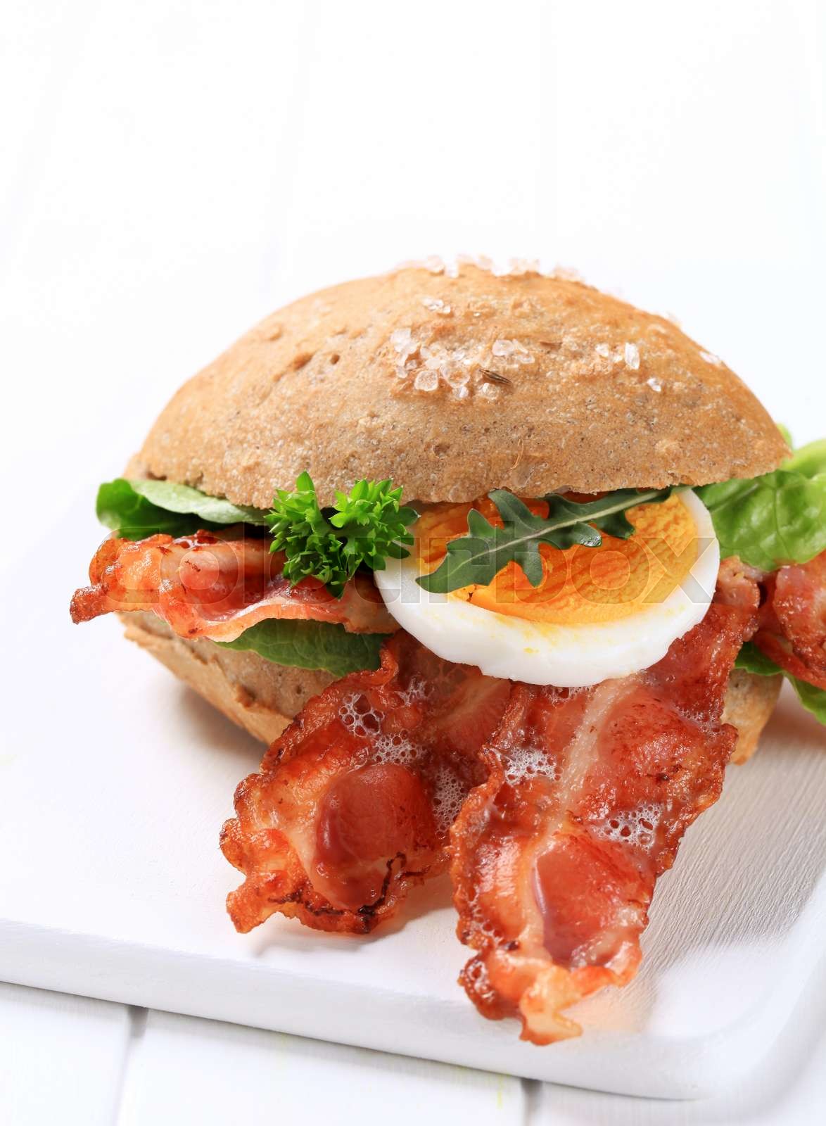 Bread bun with crispy bacon | Stock image | Colourbox