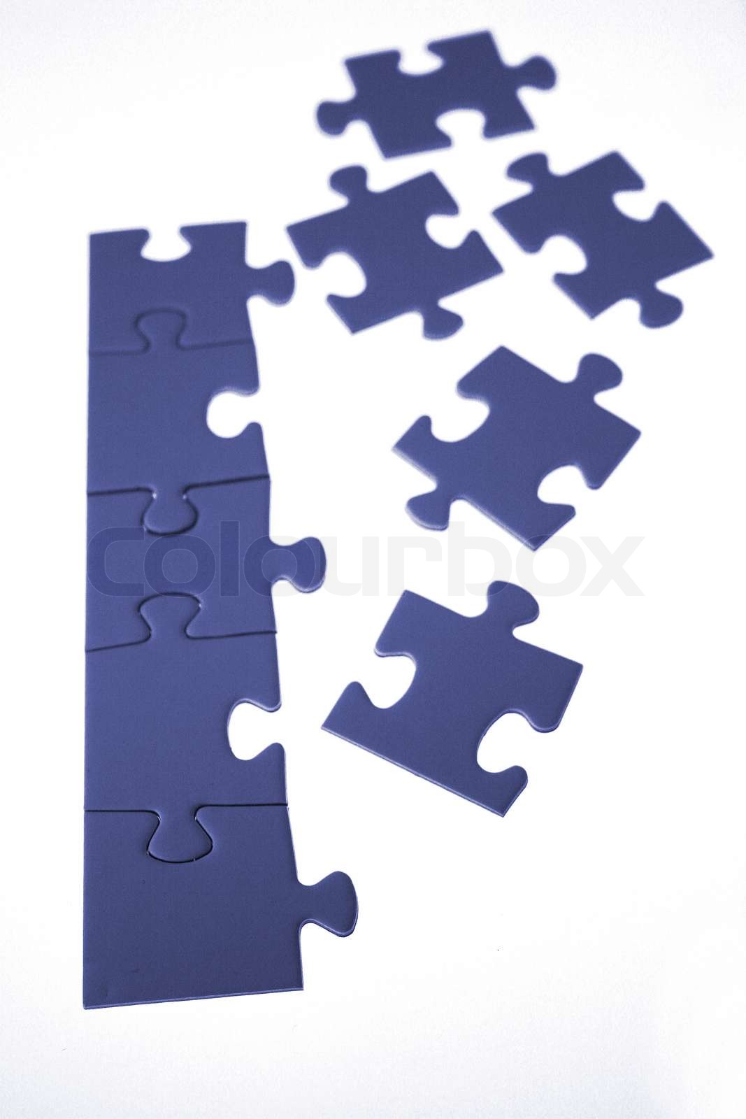 puzzle with one part outstanding | Stock image | Colourbox