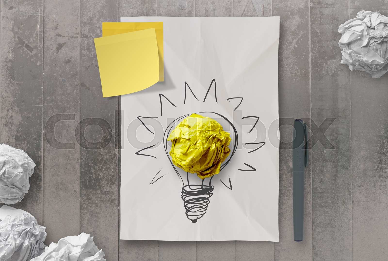 sticky note with another idea light bulb on crumpled paper as creative ...