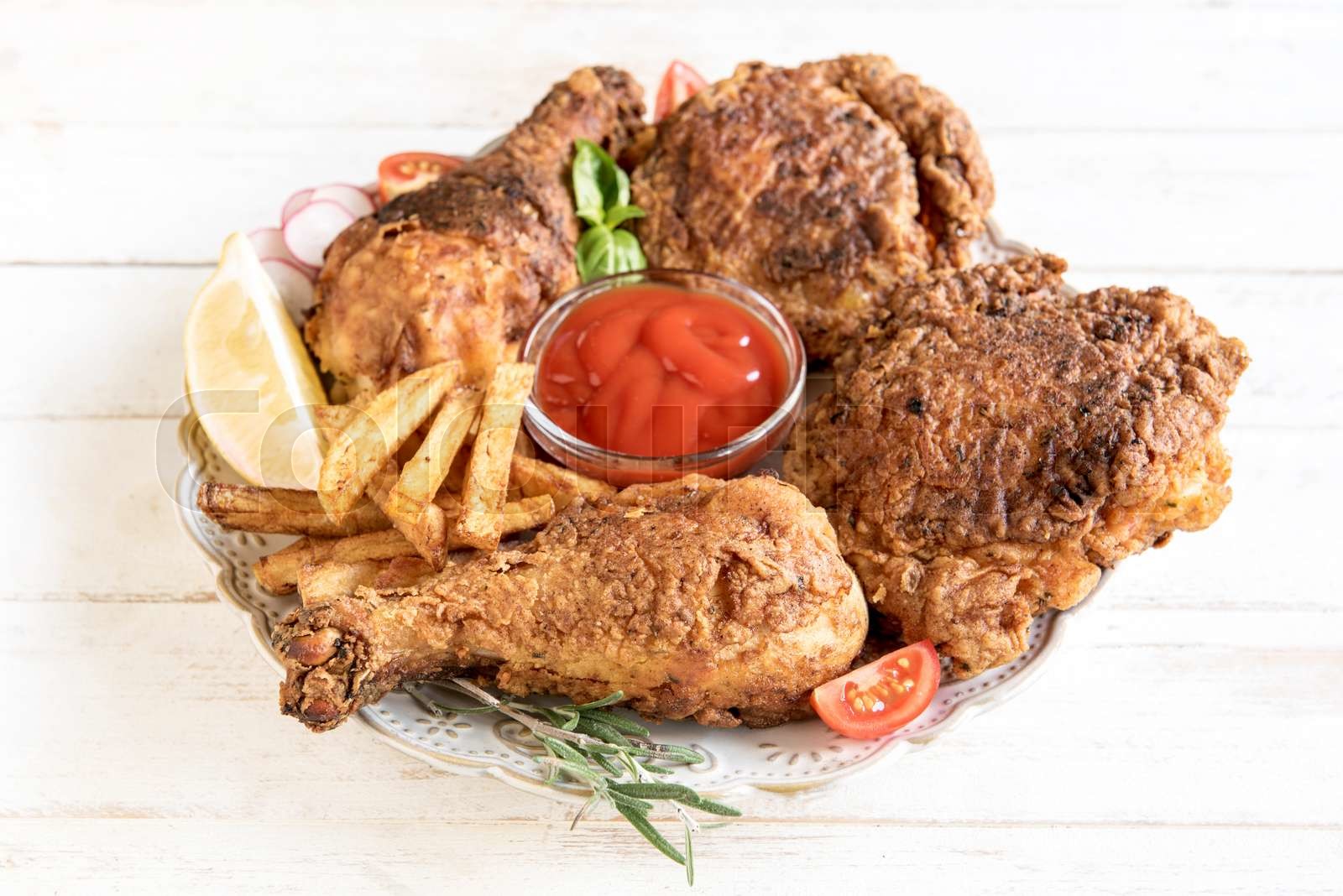 Served fried chicken and french fries | Stock image | Colourbox