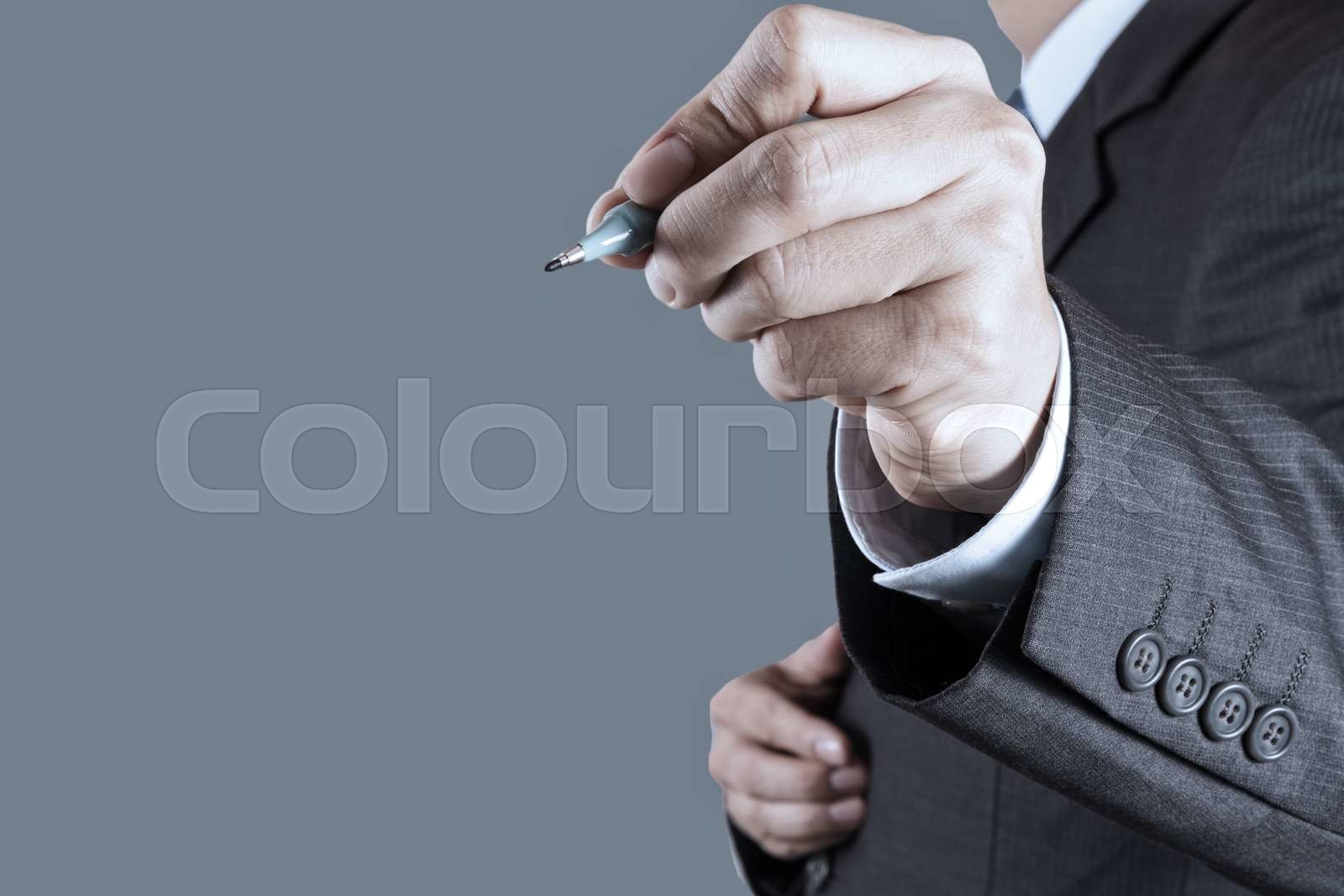 businessman hand writing in the whiteboard | Stock image | Colourbox