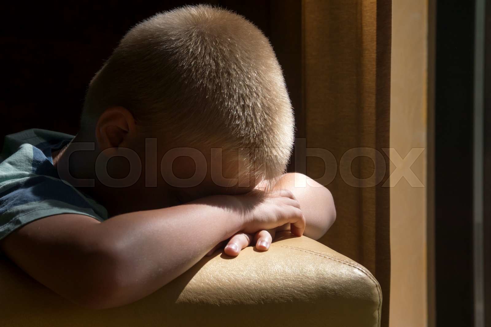 Sad upset child | Stock image | Colourbox