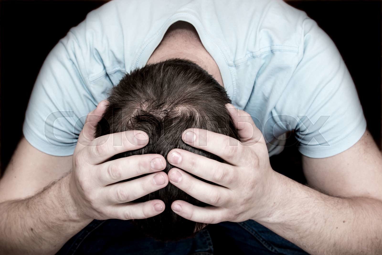 Depressed crying man | Stock image | Colourbox