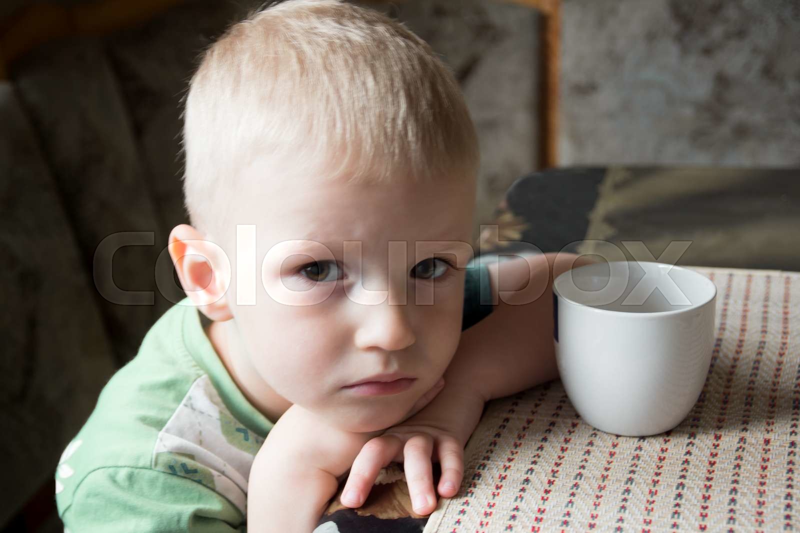 Sad tired child | Stock image | Colourbox