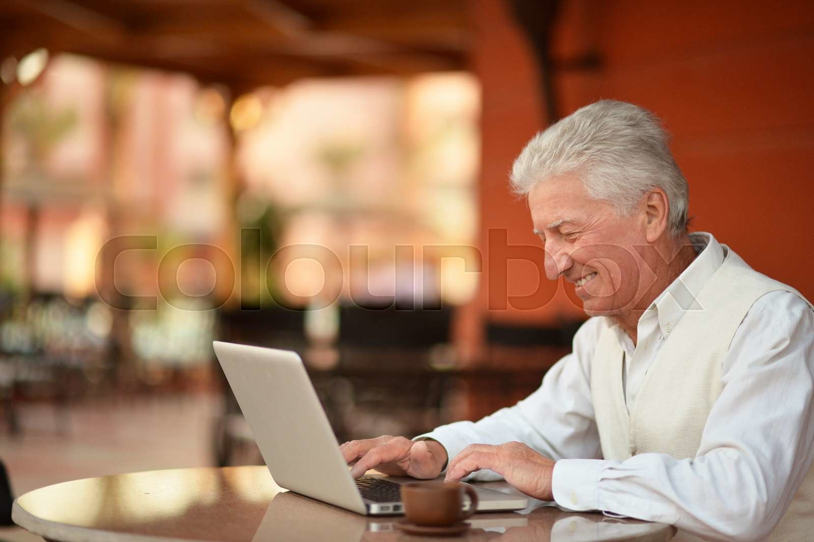 man sitting with laptop | Stock image | Colourbox