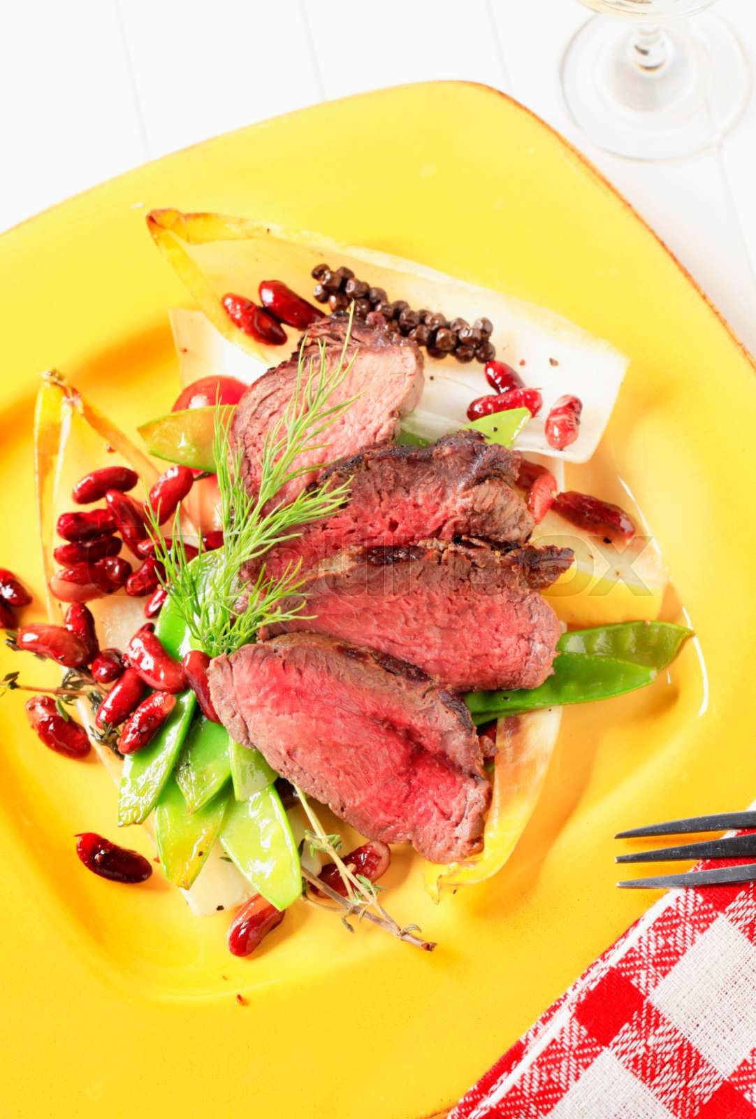 Roast beef with vegetable garnish | Stock image | Colourbox