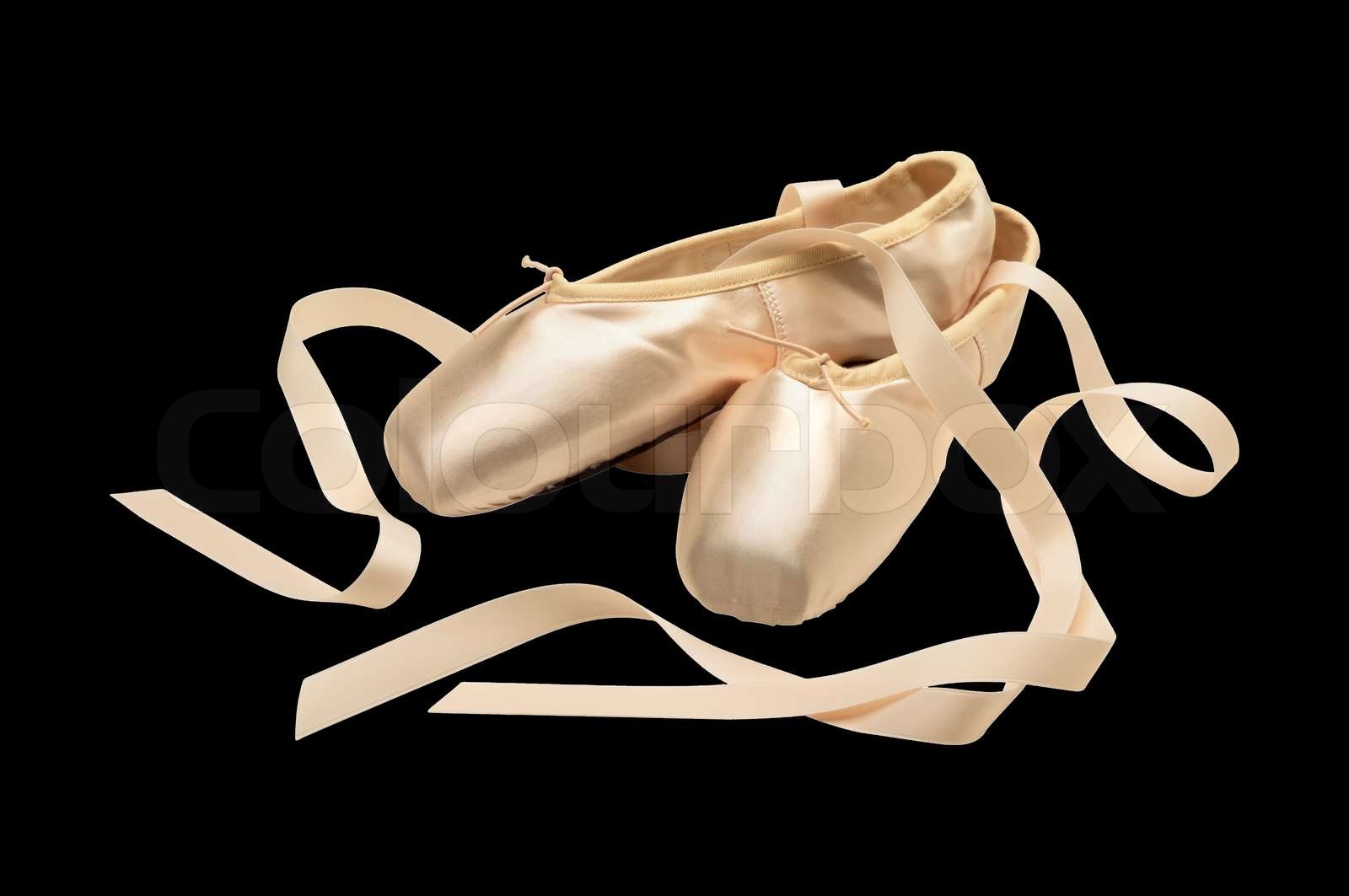 Pink ballet sko isoleret på sort baggrund | Stock foto | Colourbox