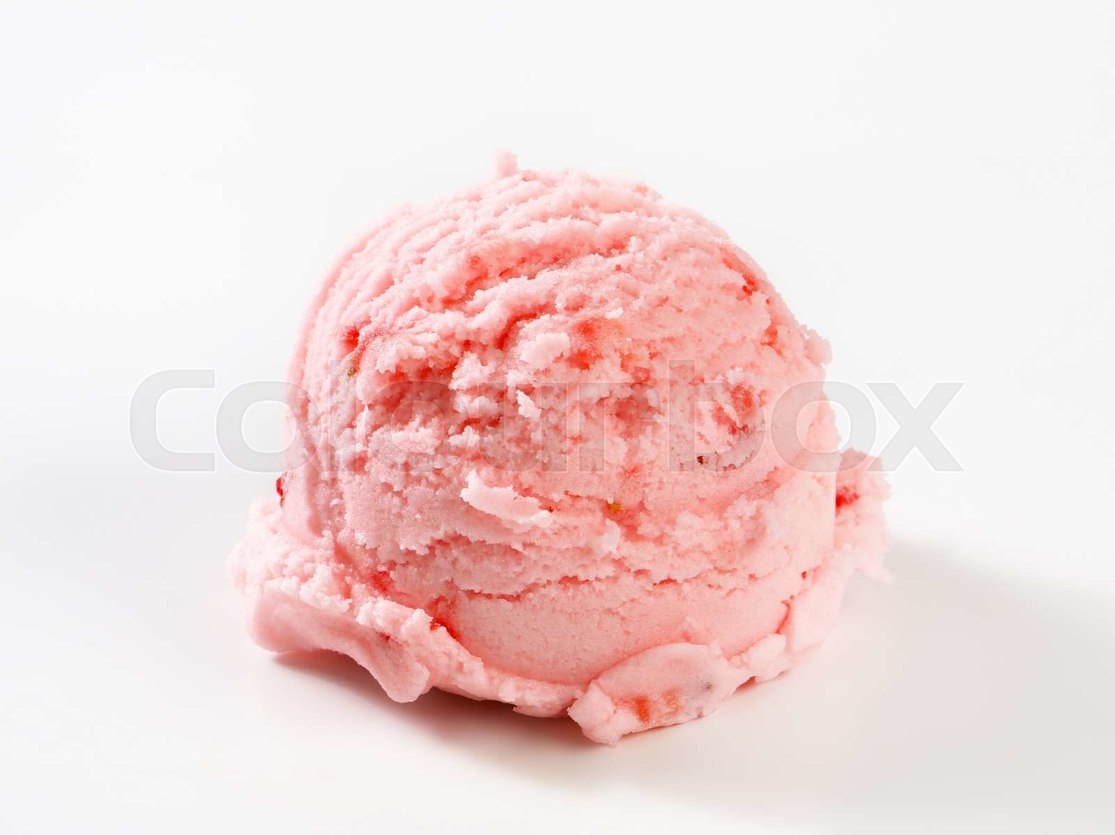 Scoop of pink ice cream | Stock image | Colourbox