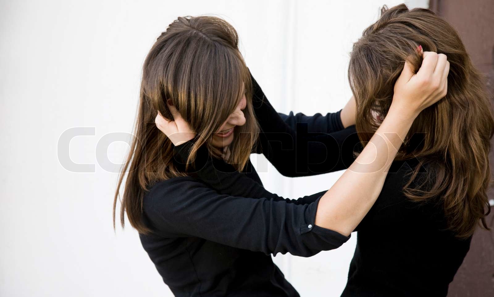 Conflict. Two Teenager Girls Fighting Outdoors. | Stock image | Colourbox