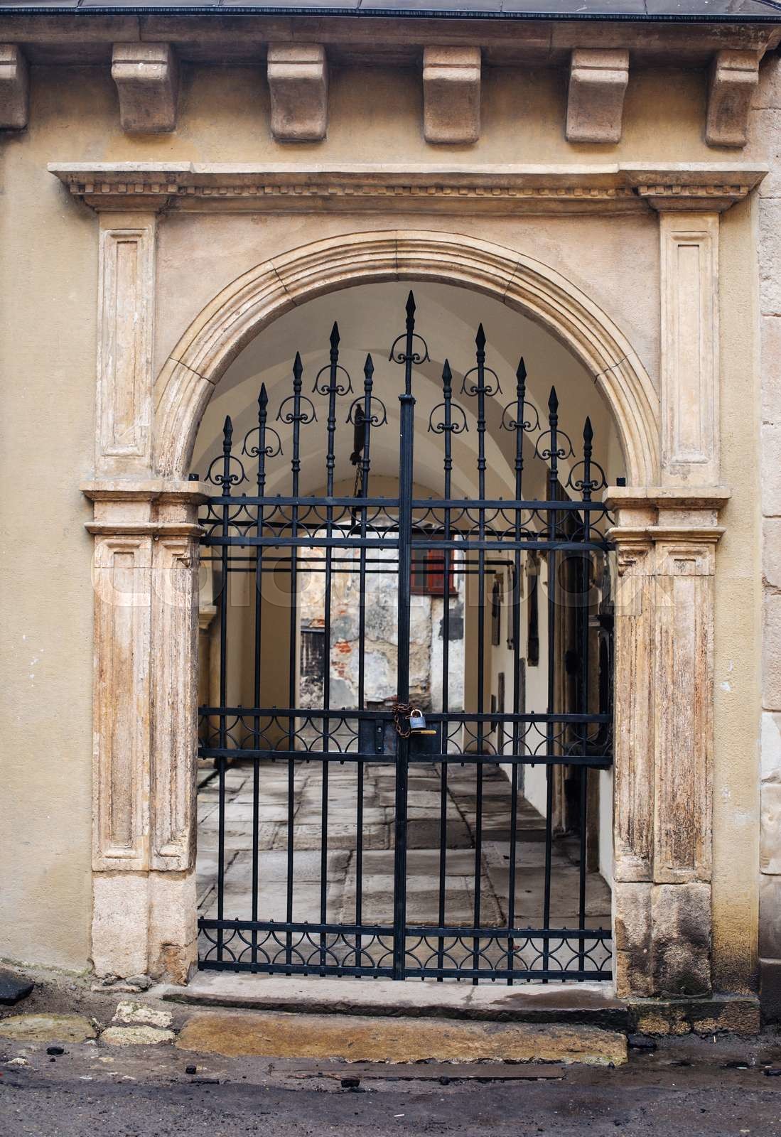 old architecture of the city with metal gates | Stock image | Colourbox
