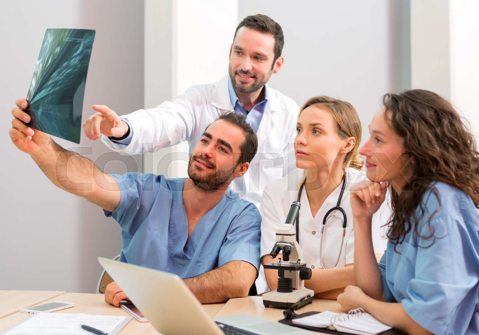 Medical team working at the hospital all together | Stock image | Colourbox