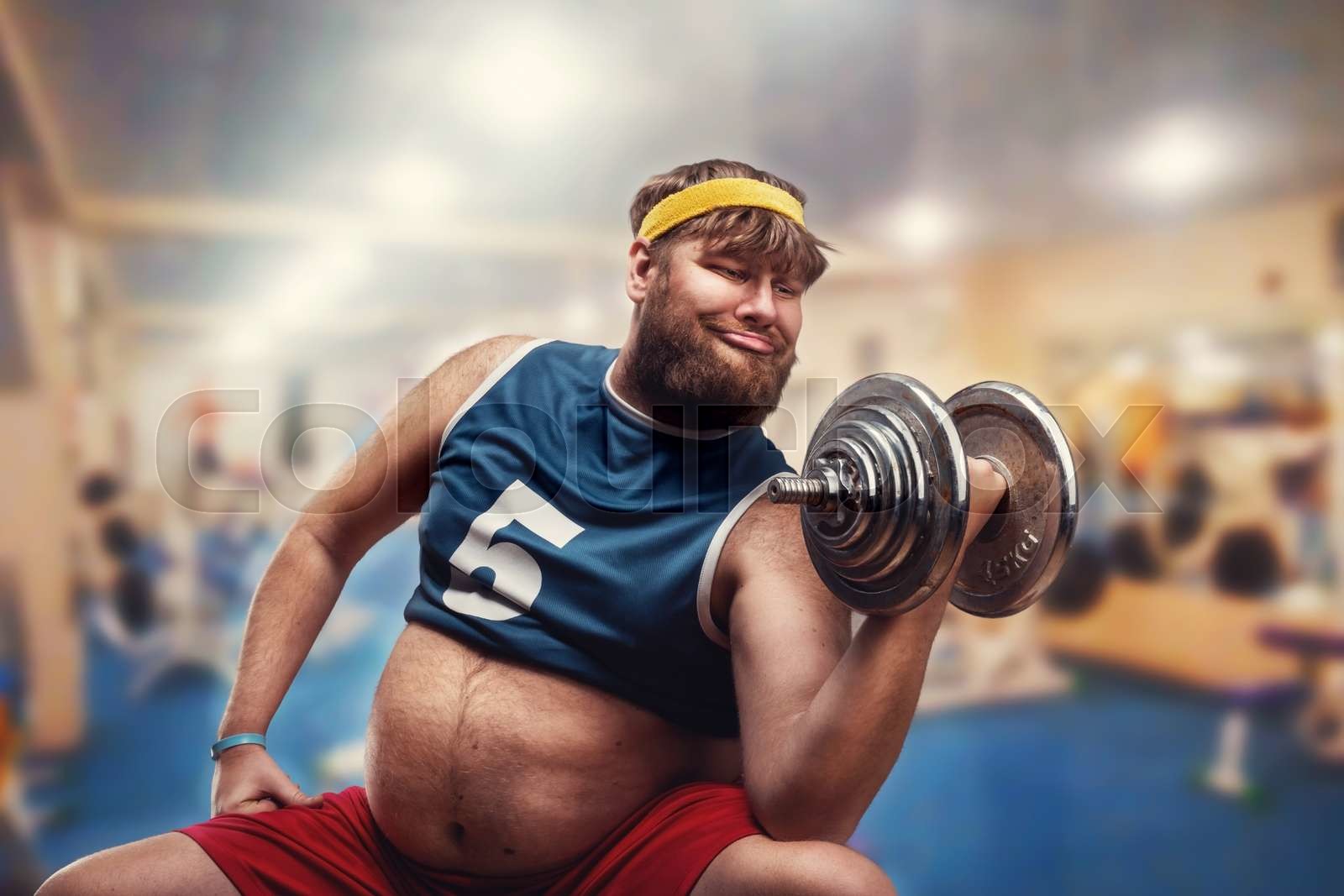 Man with a dumbbell | Stock image | Colourbox
