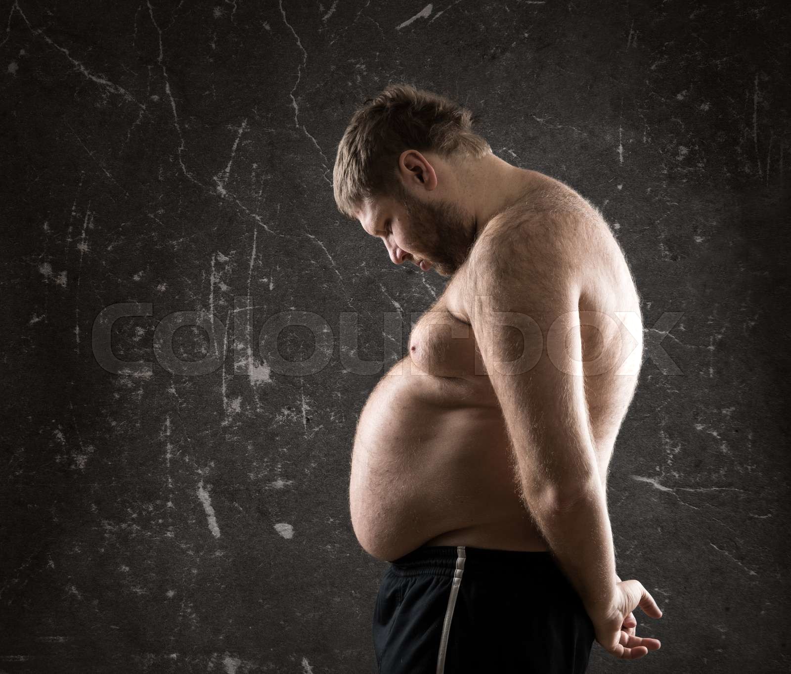 Fat man profile | Stock image | Colourbox