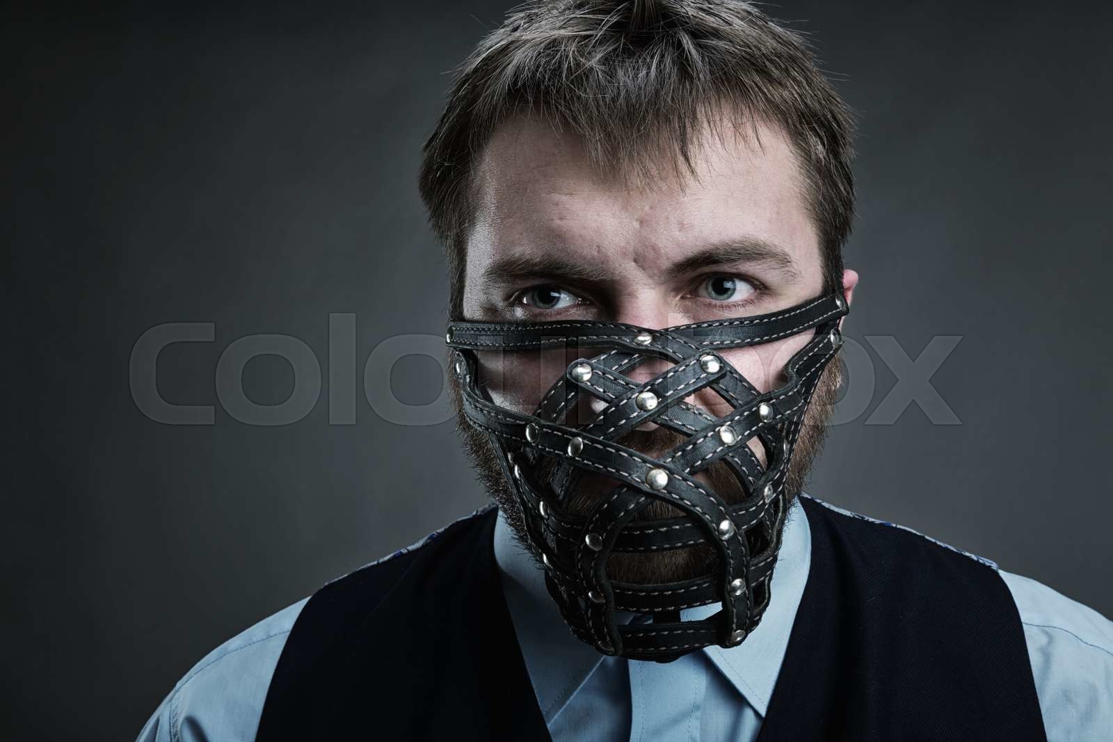 Man in muzzle | Stock image | Colourbox