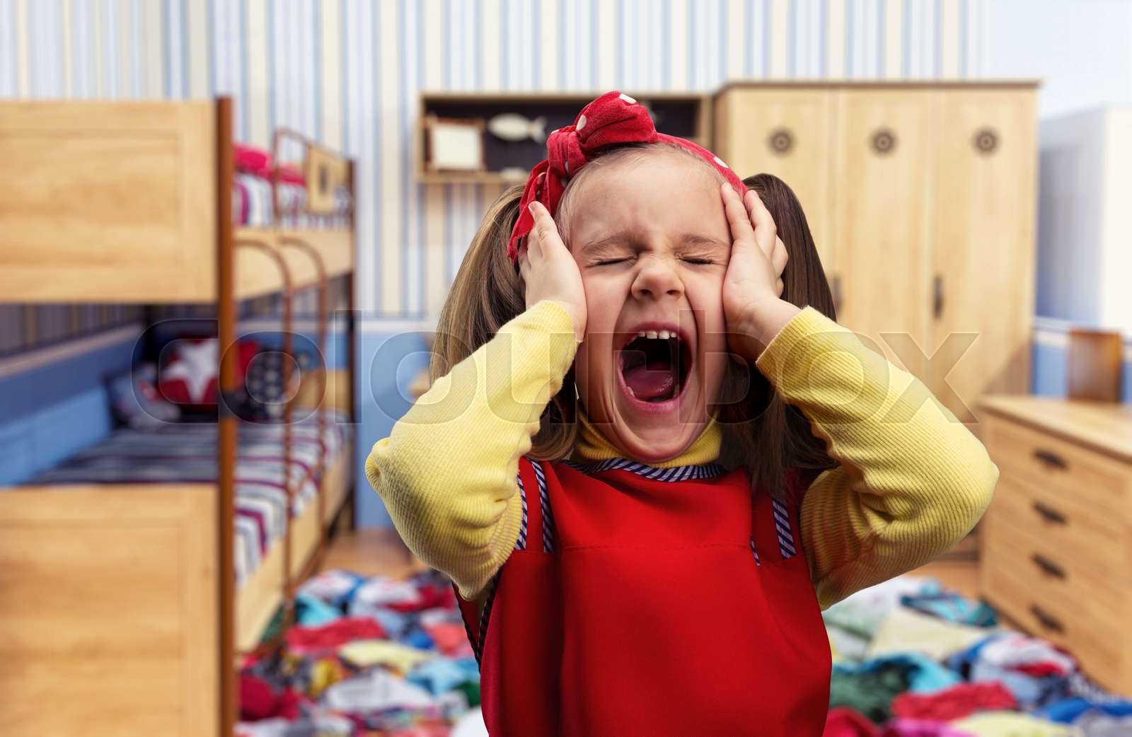 Little girl screaming | Stock image | Colourbox