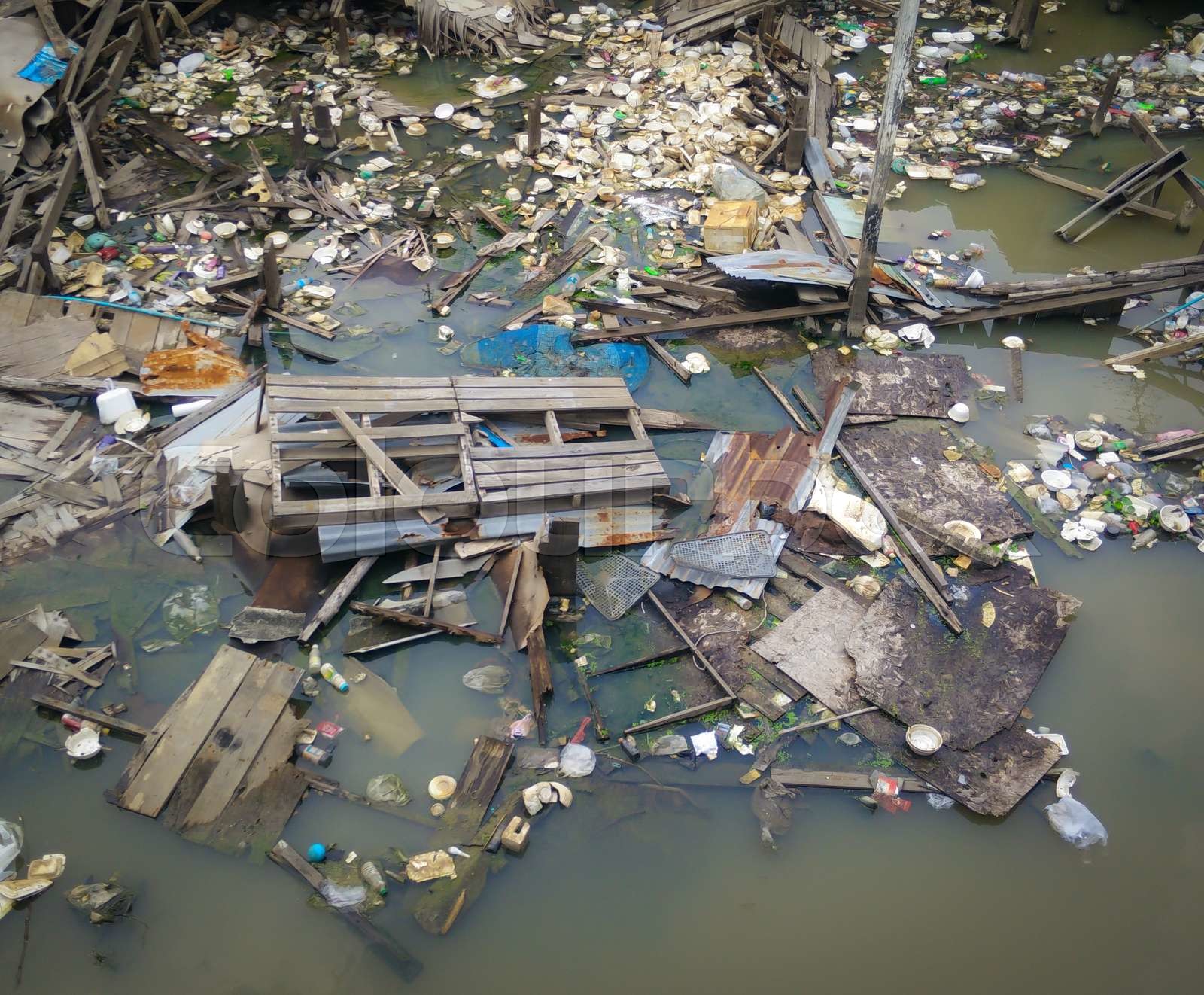 garbage in drainage canal. | Stock image | Colourbox