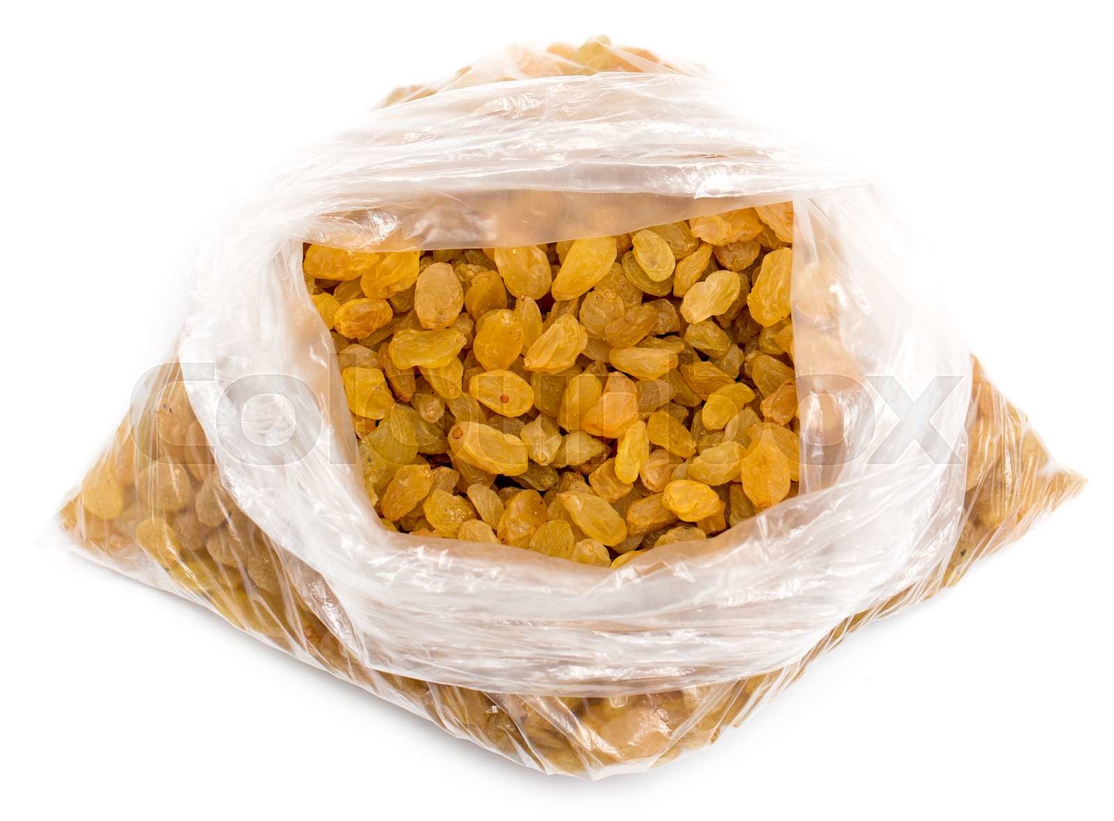 yellow raisins in a plastic bag | Stock image | Colourbox