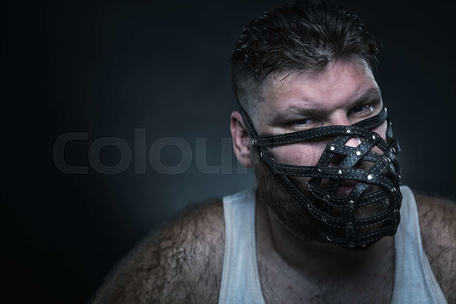 Man in muzzle | Stock image | Colourbox