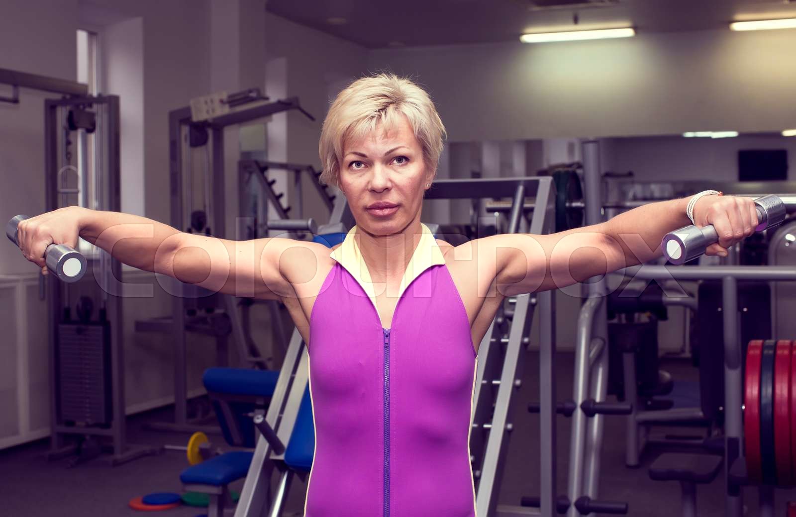 adult female bodybuilding competitions in the gym | Stock image | Colourbox