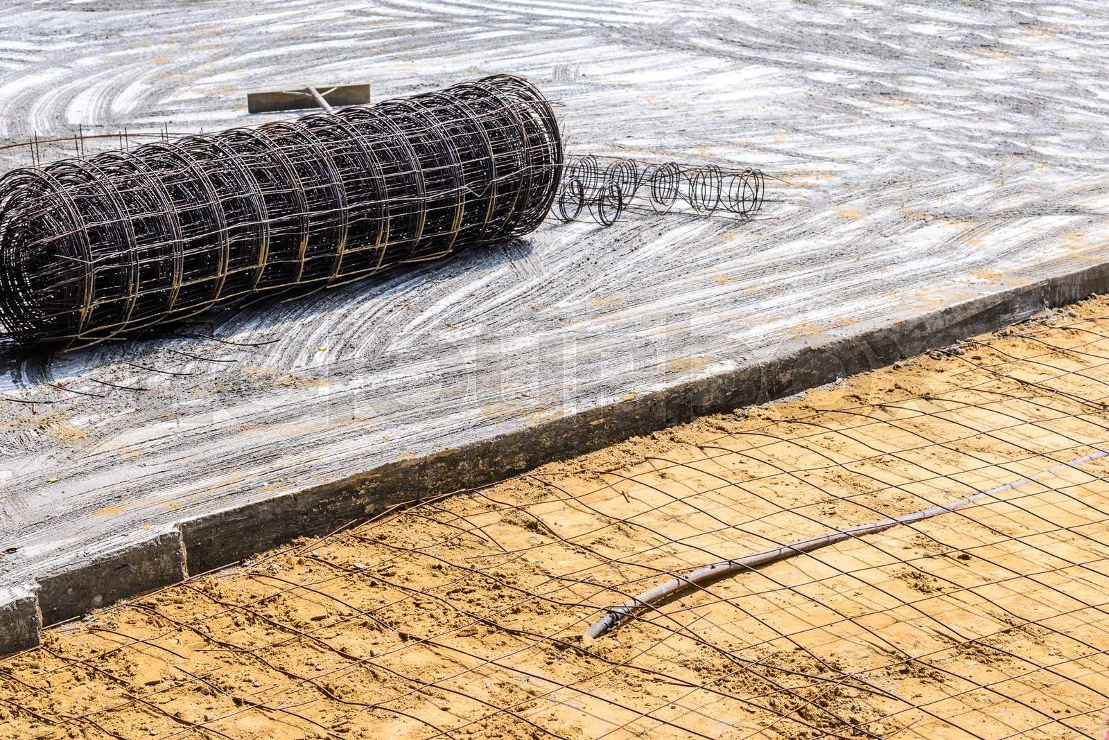 Meshing rebar for flooring with cement. | Stock image | Colourbox