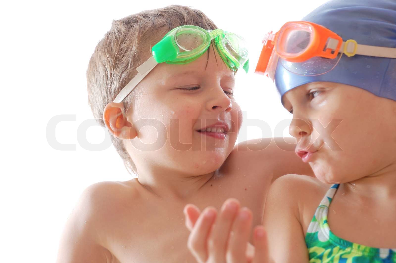 two kids with goggles on their heads talking | Stock image | Colourbox