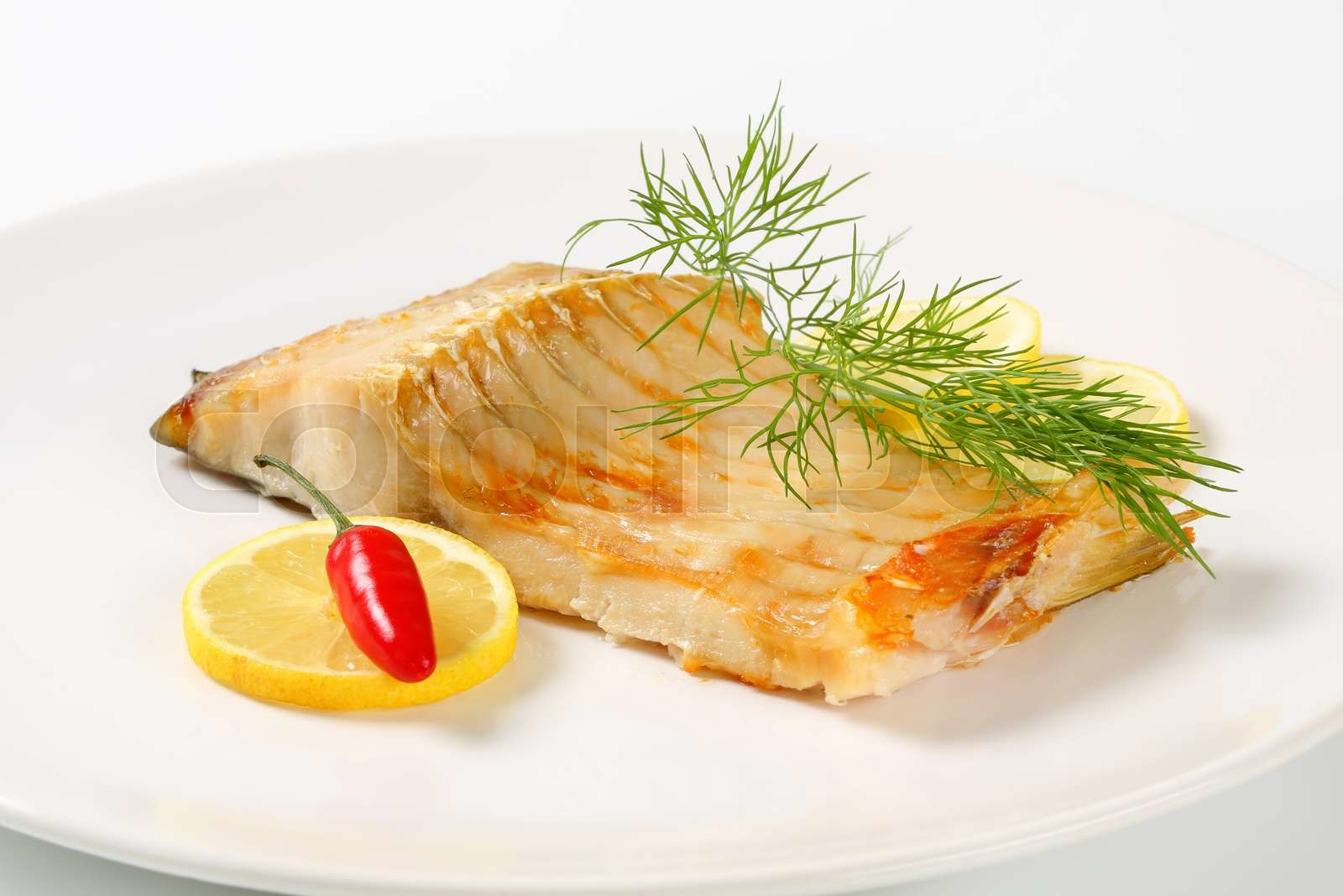 Oven baked carp fillet | Stock image | Colourbox