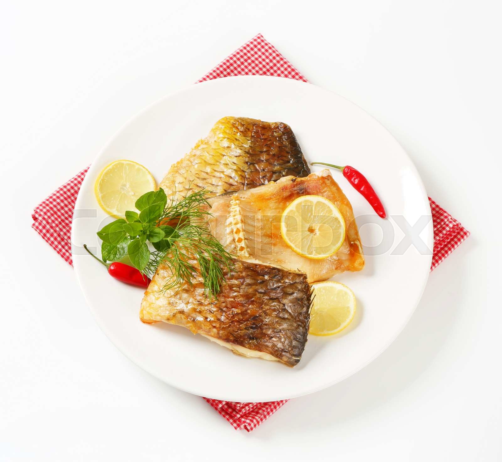 Oven baked carp fillets with crispy skin | Stock image | Colourbox