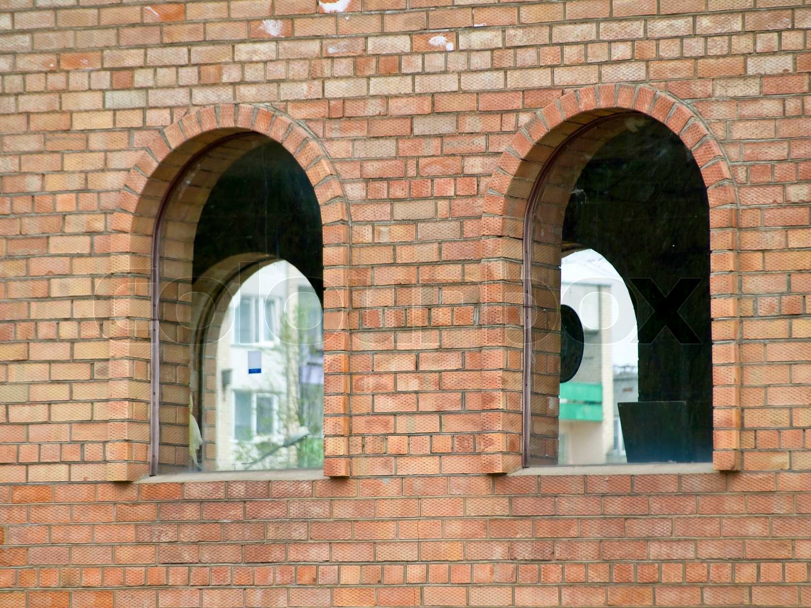 Two arcs at the bricks wall of the modern building | Stock image ...