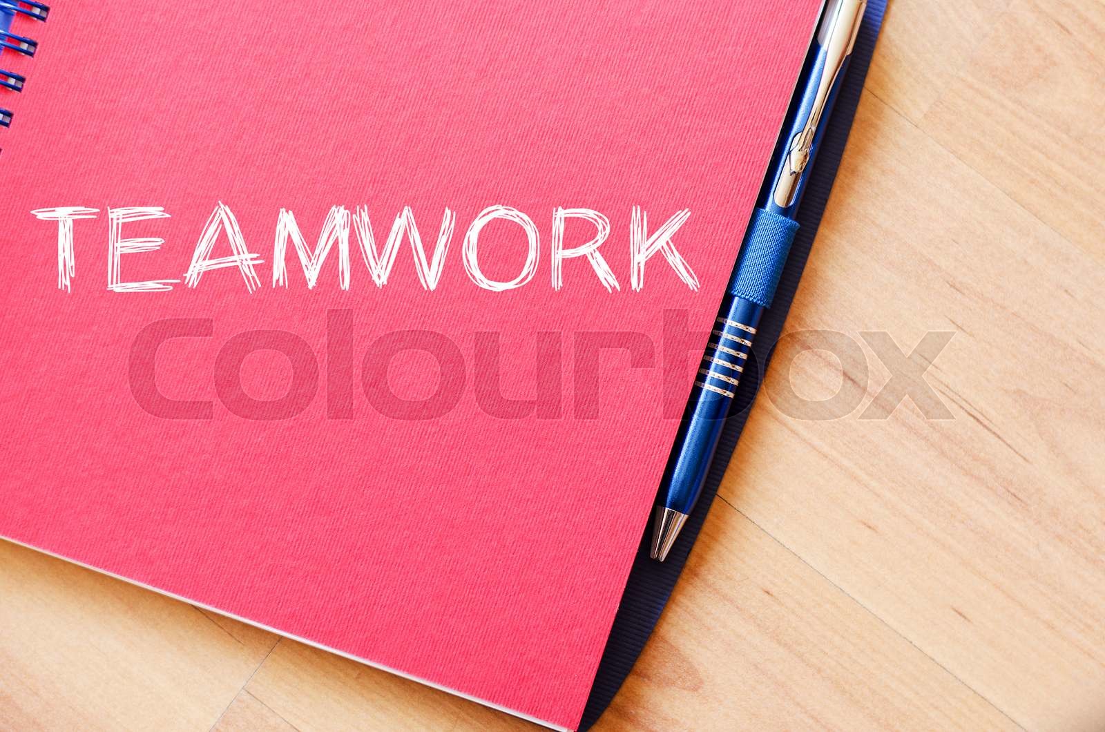 Teamwork write on notebook | Stock image | Colourbox