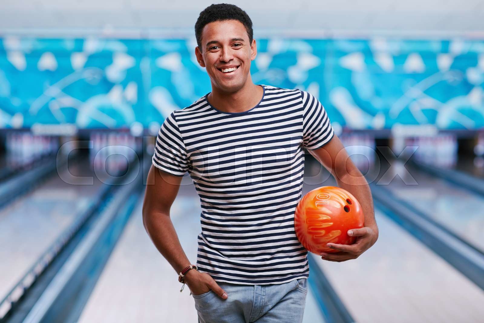 Guy with bowling ball | Stock image | Colourbox