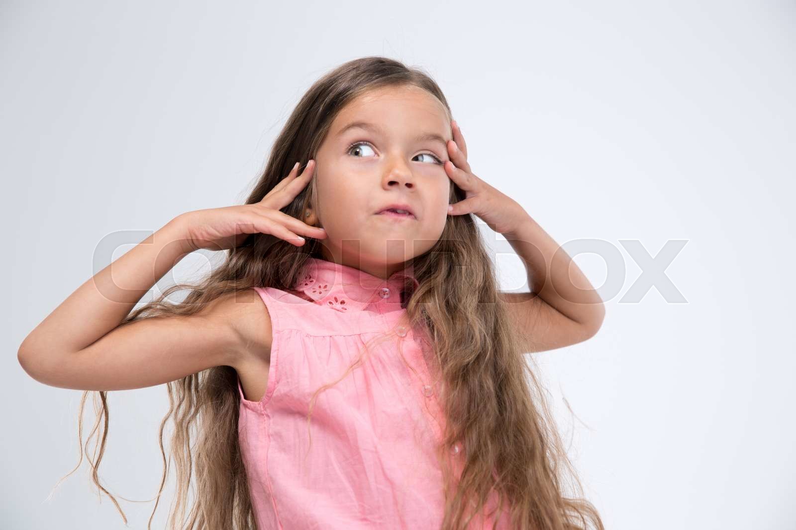 Little girl making silly face | Stock image | Colourbox