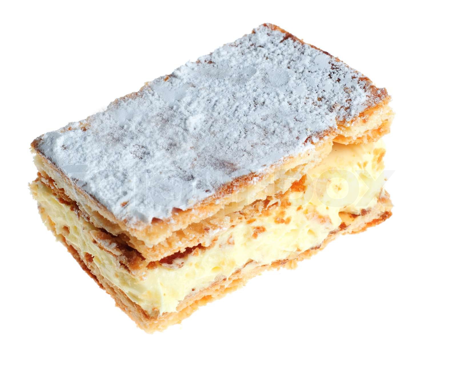 Napoleon kage med aftørring af støv isoleret på hvid baggrund | Stock ...