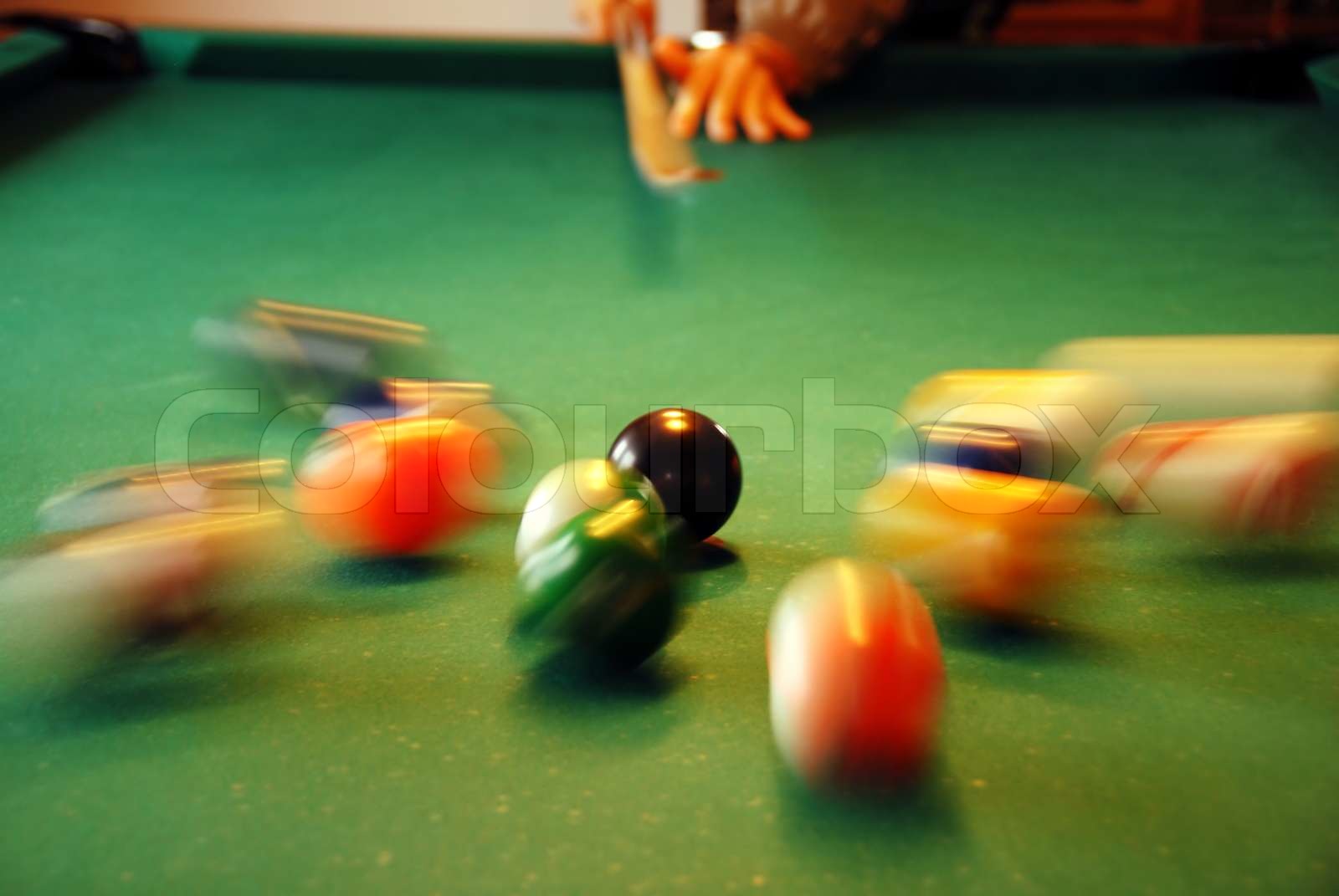 cue shooting at billiards balls movement indoor | Stock image | Colourbox