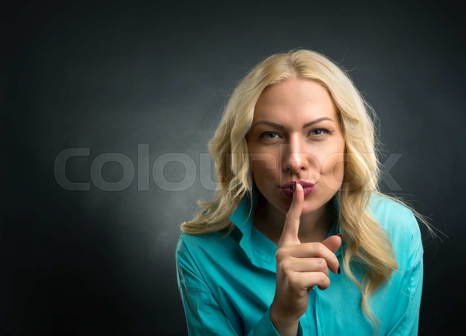 Silence hand sign | Stock image | Colourbox
