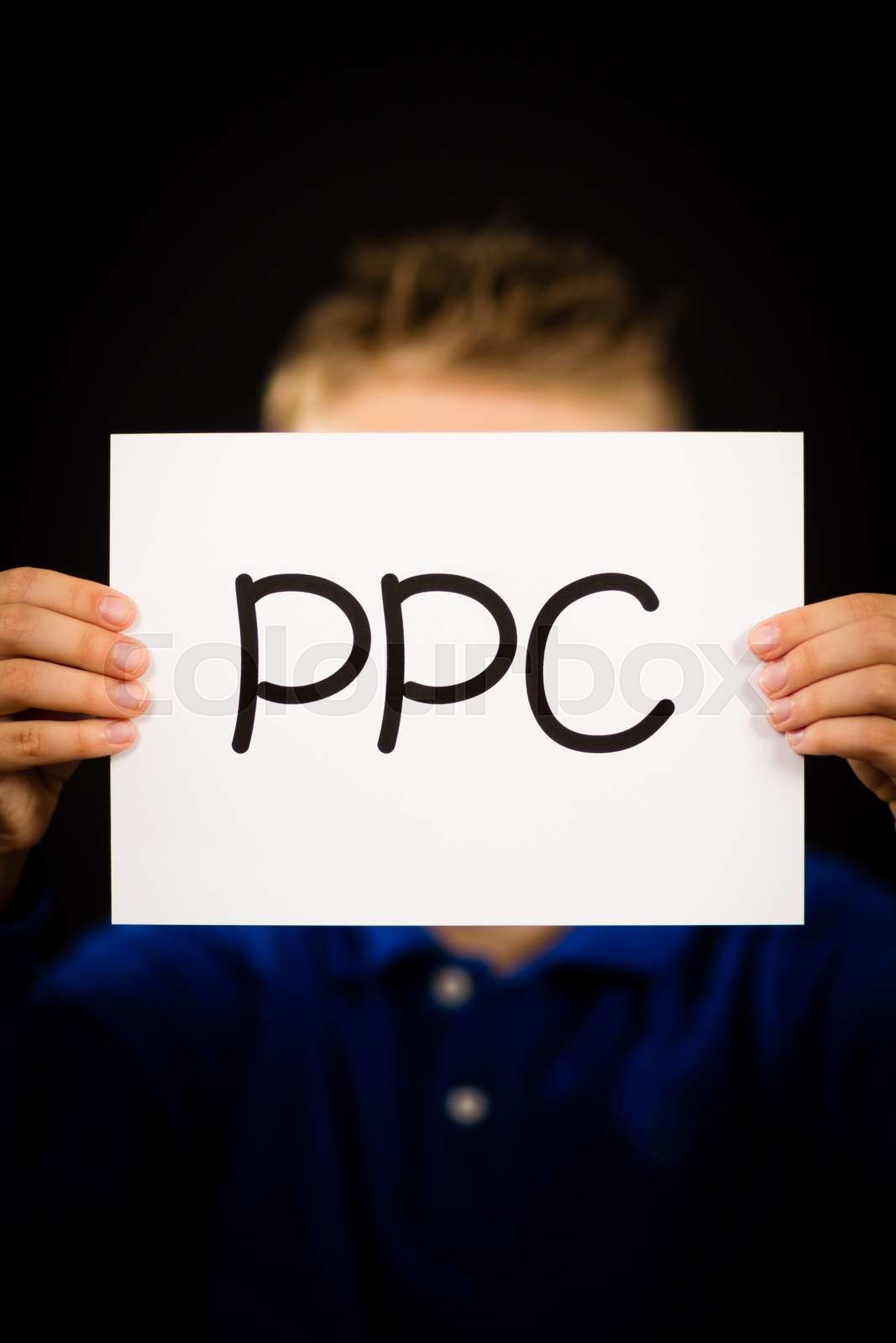 Person holding PPC sign | Stock image | Colourbox