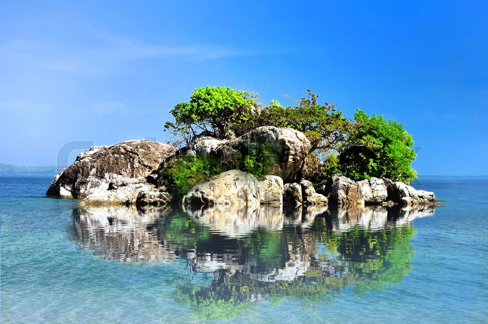 Small tropical island in the ocean | Stock image | Colourbox