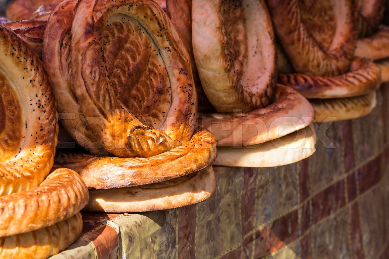 Kirghiz bread tokoch on Sunday market in Osh. Kyrgyzstan. | Stock image ...